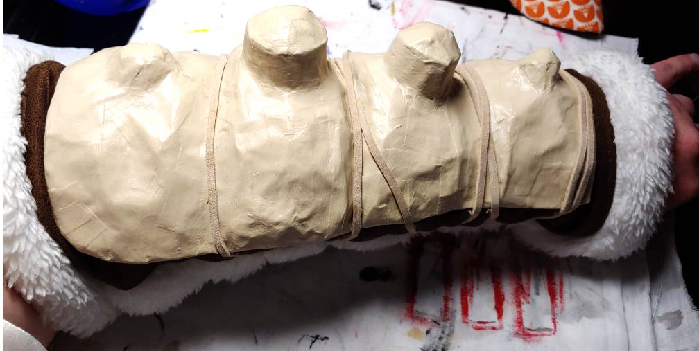 Paper mache bone gauntlet with vertebrae – Leafnin Cosplay